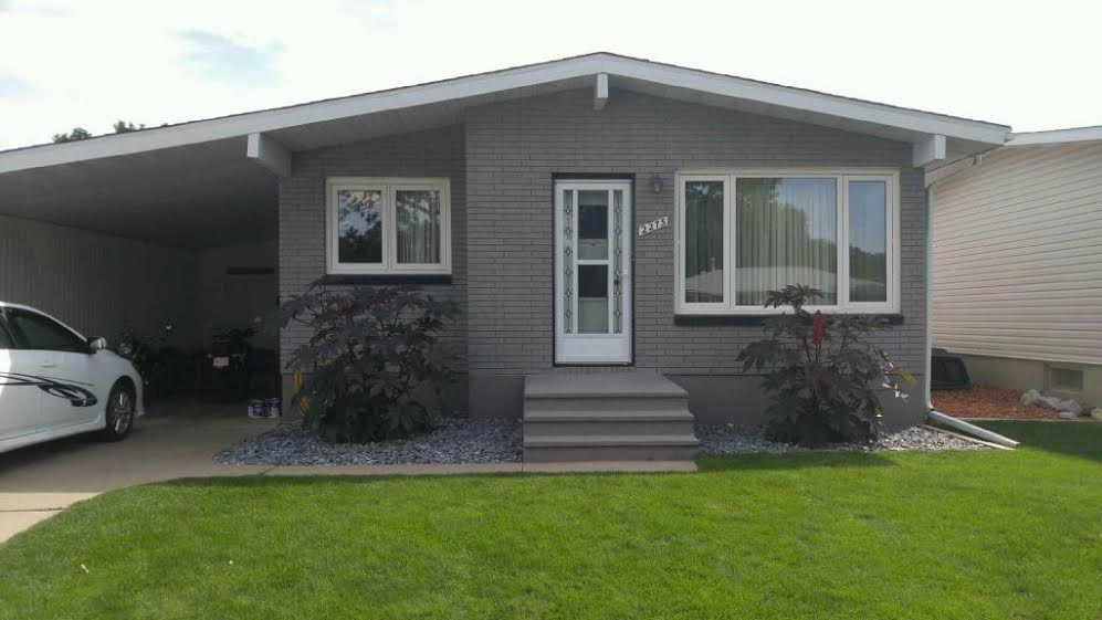 Residential Gray Brick Exterior - CertaPro Painters® of Lethbridge